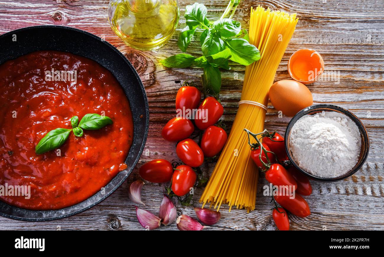Composition with dried spaghetti, and pasta ingredients Stock Photo - Alamy