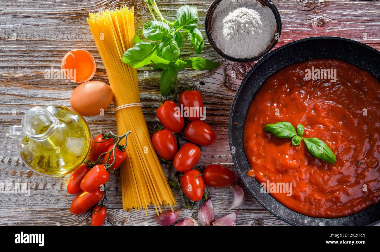 Composition with dried spaghetti, and pasta ingredients Stock Photo - Alamy