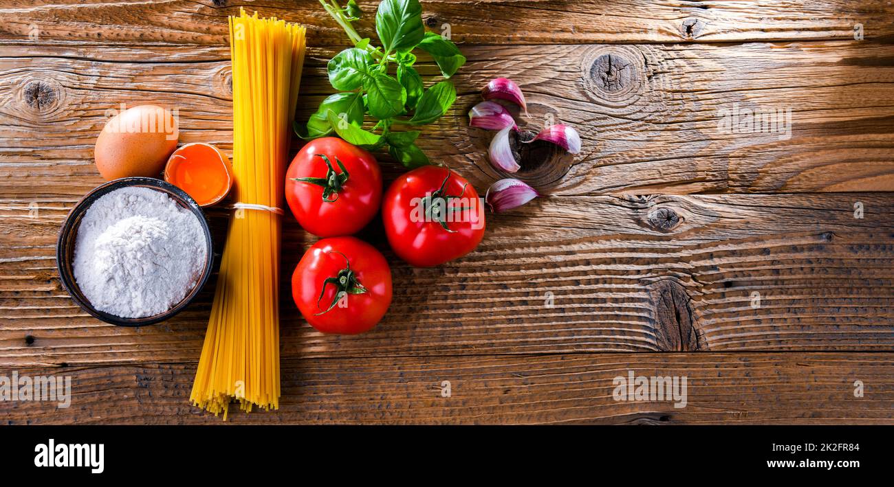 Composition with dried spaghetti, and pasta ingredients Stock Photo - Alamy