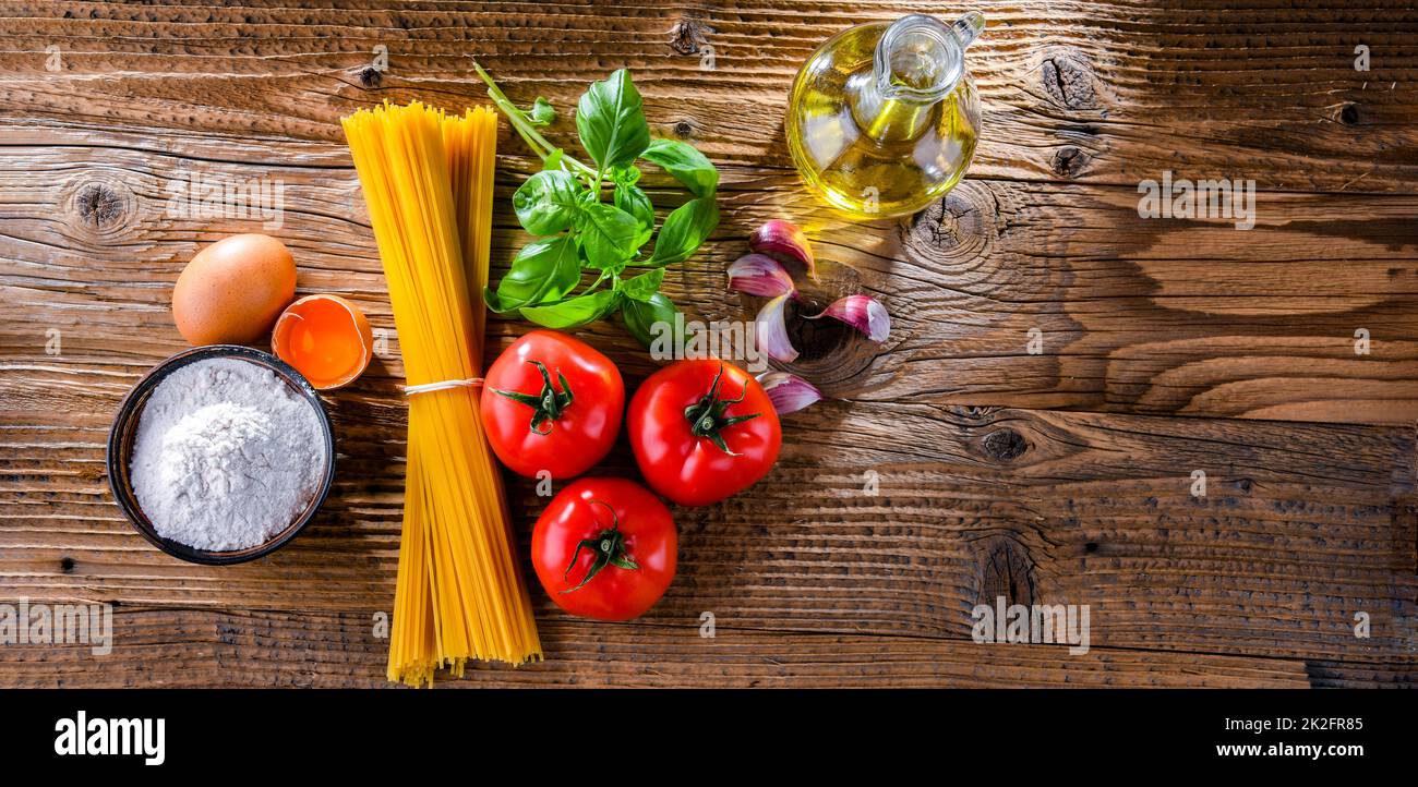 Composition with dried spaghetti, and pasta ingredients Stock Photo - Alamy