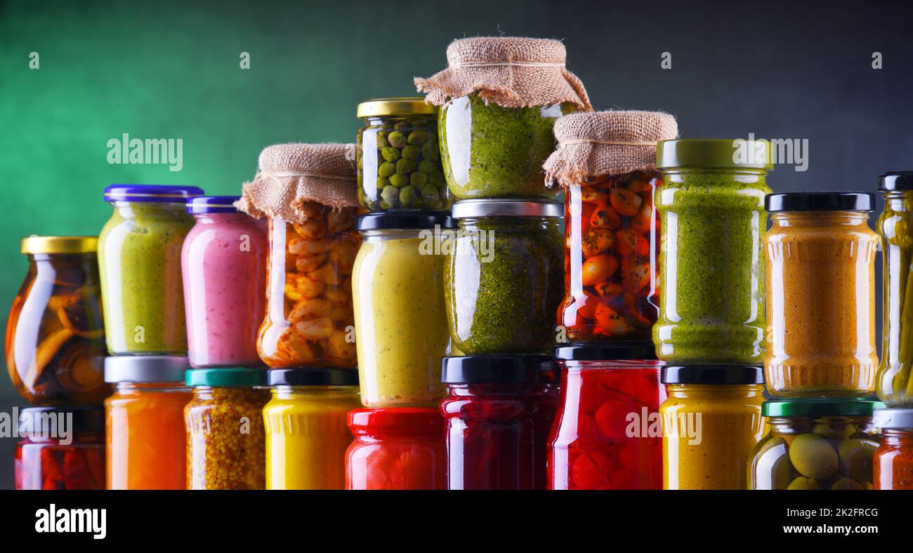 Jars with variety of pickled vegetables and fruits Stock Photo - Alamy