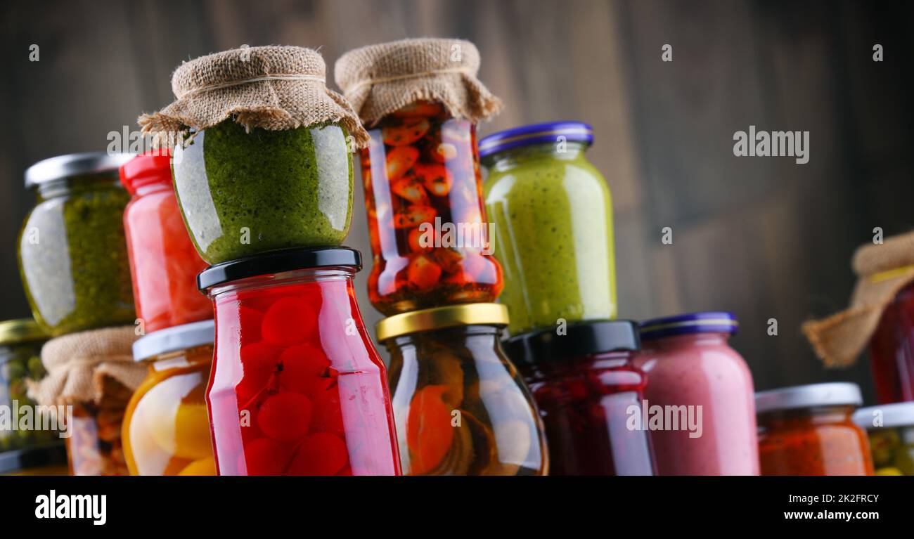 Jars with variety of pickled vegetables and fruits Stock Photo - Alamy