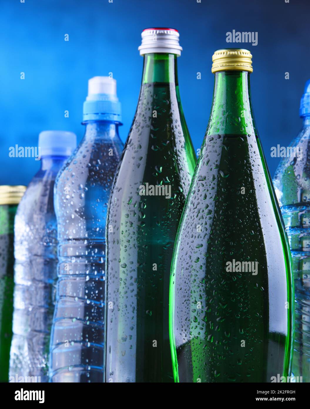 Different sorts of bottles containing mineral water Stock Photo - Alamy
