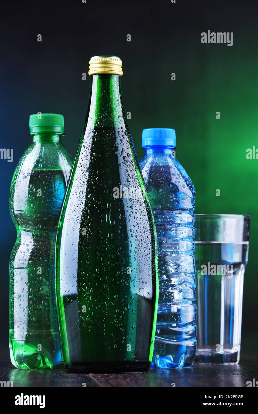 Different sorts of bottles containing mineral water Stock Photo - Alamy