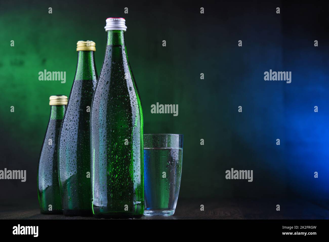 Different sorts of bottles containing mineral water Stock Photo - Alamy