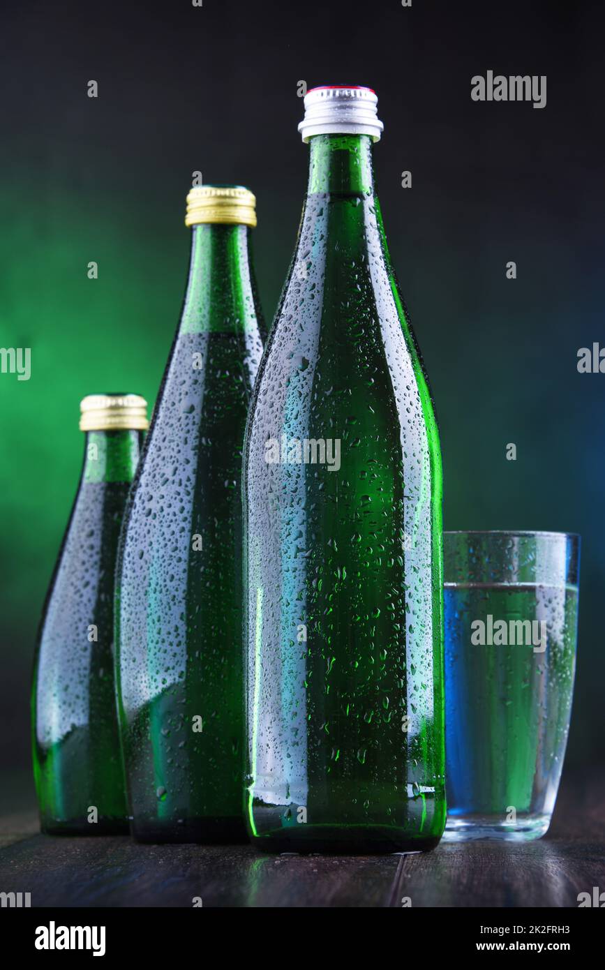 Different sorts of bottles containing mineral water Stock Photo - Alamy