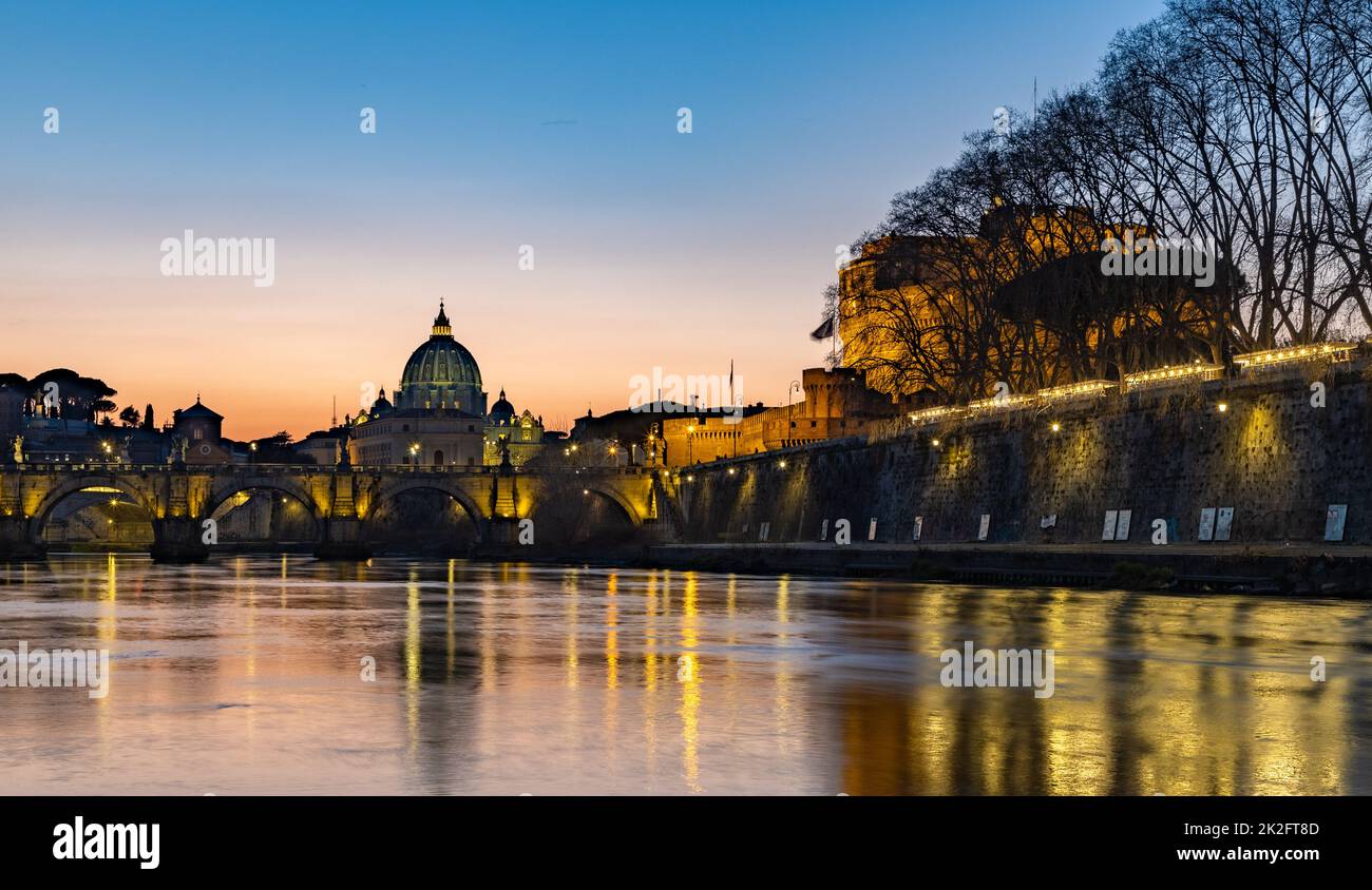 St. Angelo Bridge, Castel Sant'Angelo and St. Peter's Basilica at Sunset Stock Photo - Alamy