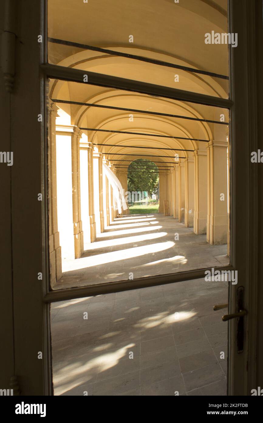 View through entrance door to the arcade corridor Stock Photo - Alamy