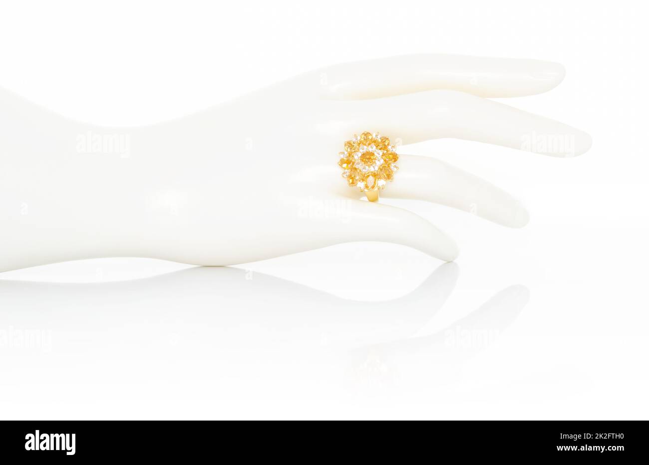 Yellow sapphire and Diamond Jewel or gems ring on plastic mannequin ...