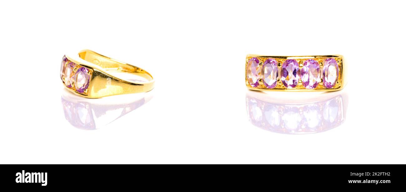 Amethyst Jewel or gems ring on white background with reflection ...