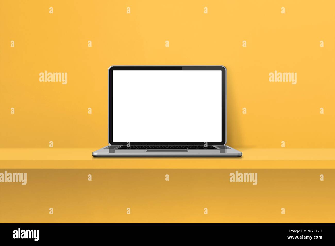 Laptop computer on yellow shelf background Stock Photo - Alamy