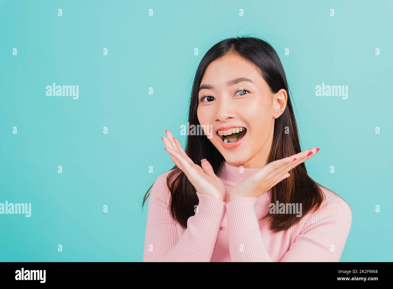 Happy young Asian beautiful woman smiling wear silicone orthodontic ...