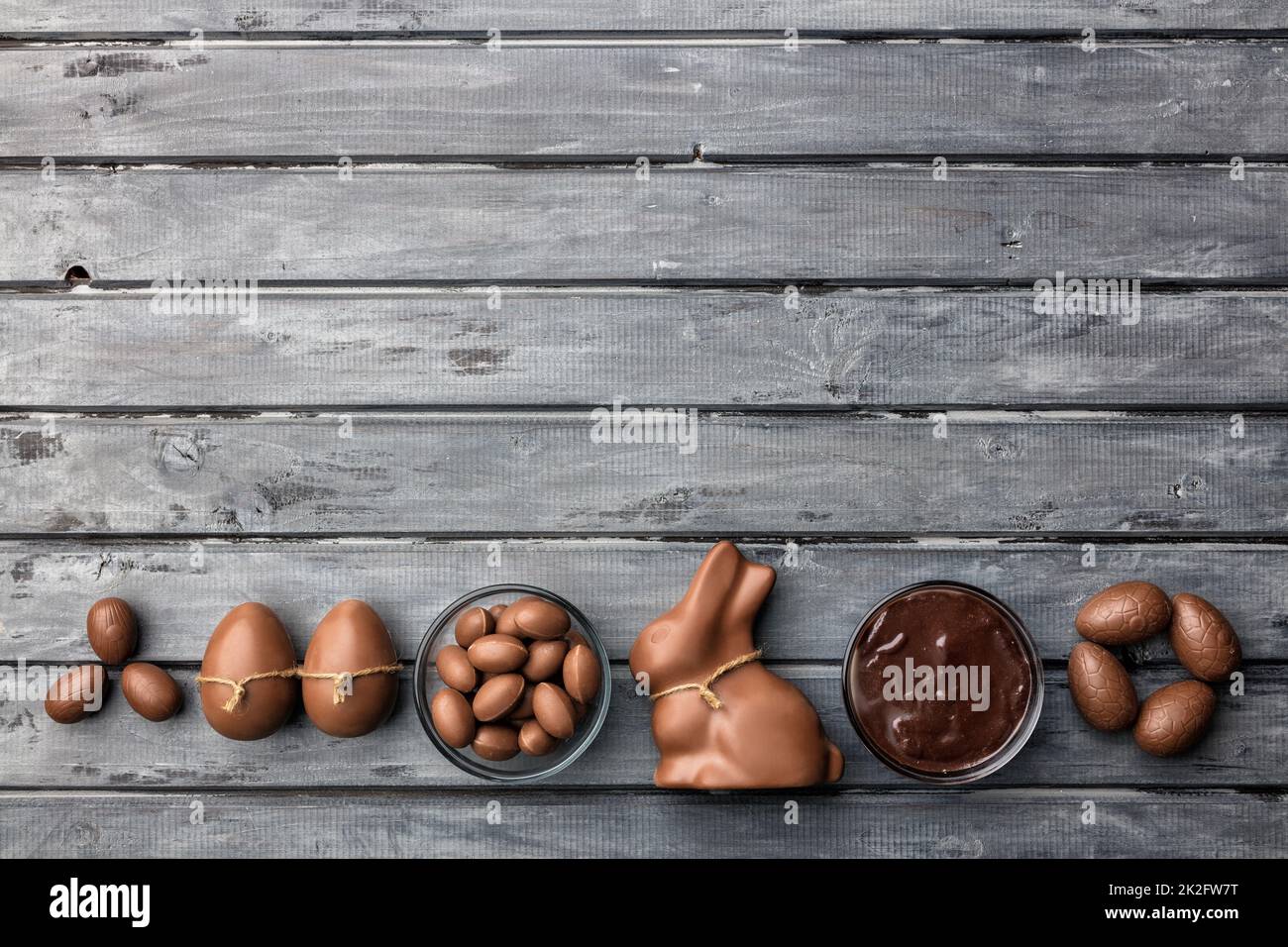 Delicious Easter chocolate bunny, eggs and sweets Stock Photo - Alamy