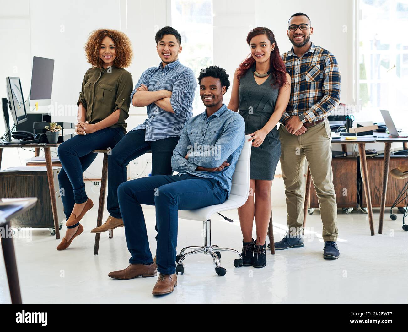 The best team for your brand. Portrait of a team of happy and confident ...