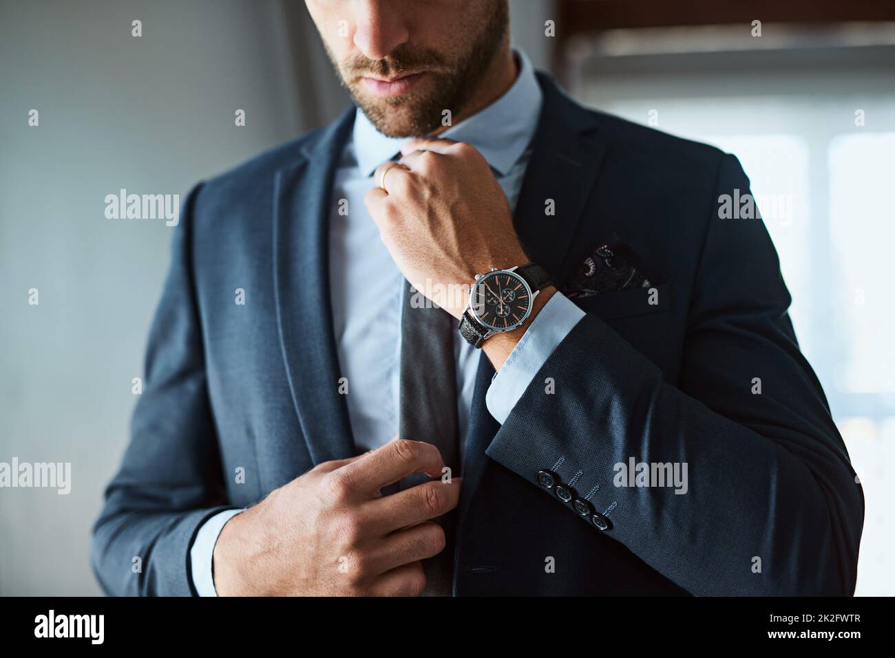 The perfect outfit means a perfect day. Shot of an unrecognizable man ...