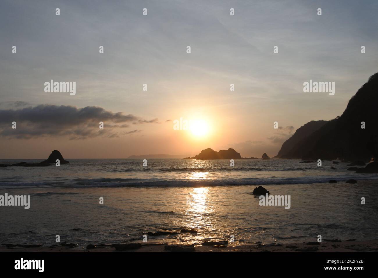 Beautiful landscape with blue sky, clouds and ocean at Papuma beach in ...