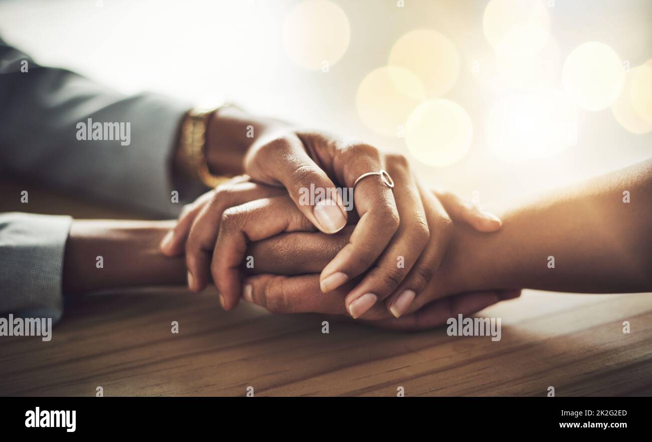 Two women hands holding hi-res stock photography and images - Alamy