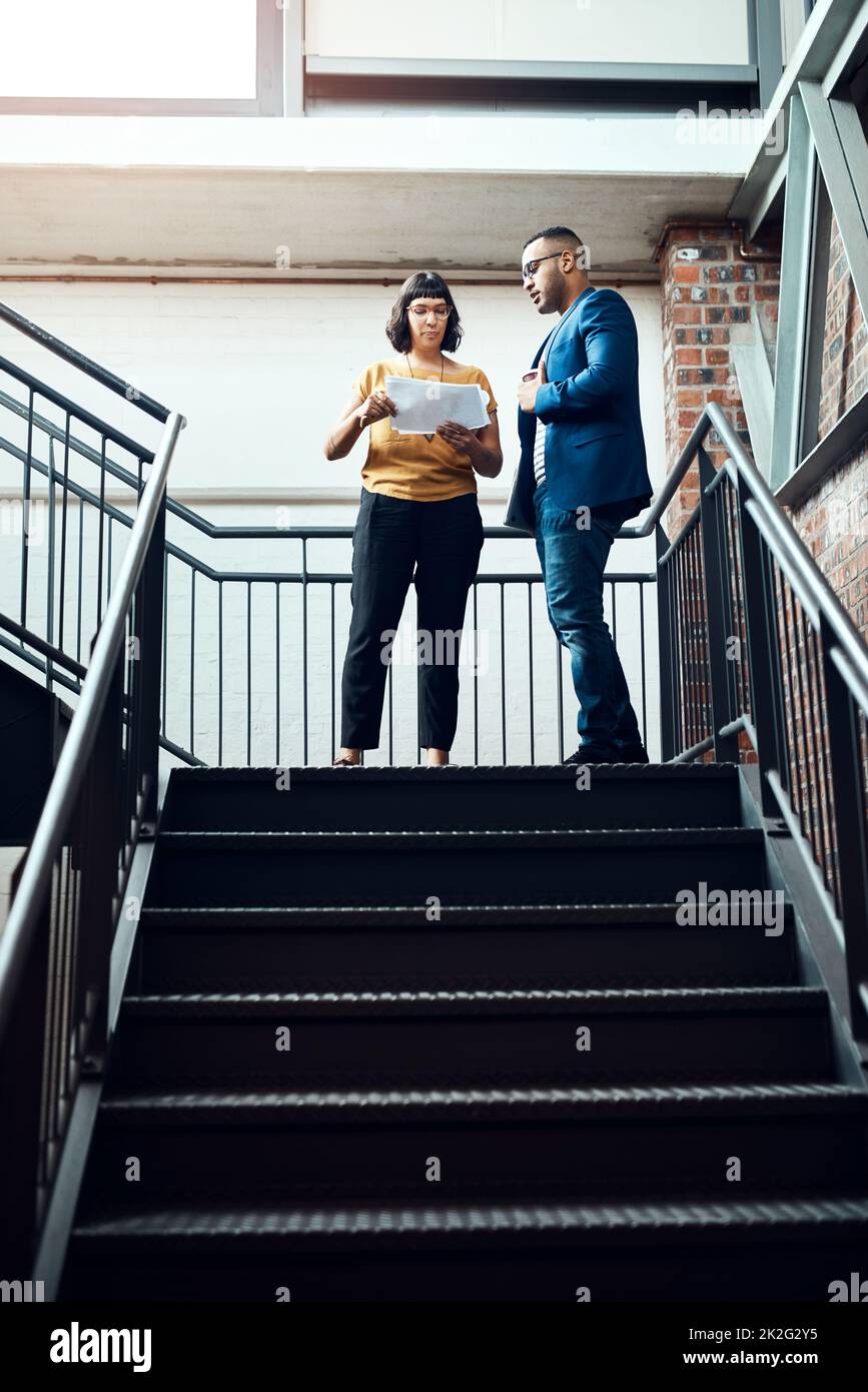 Bringing together diverse and dynamic ideas. Shot of two designers ...