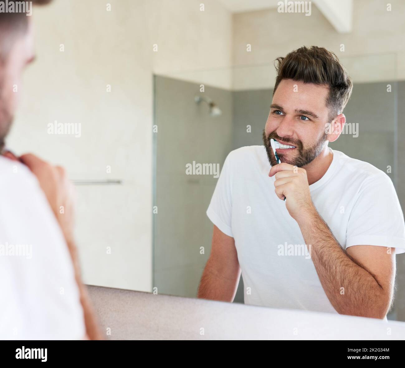 Cleanliness is next to godliness. Cropped shot of a handsome young man ...