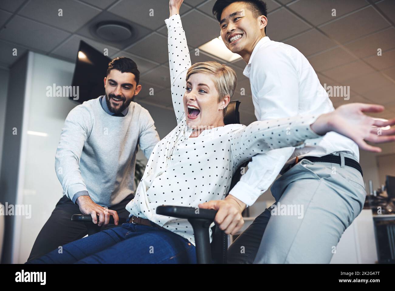 Person pushing office chair hi-res stock photography and images - Alamy