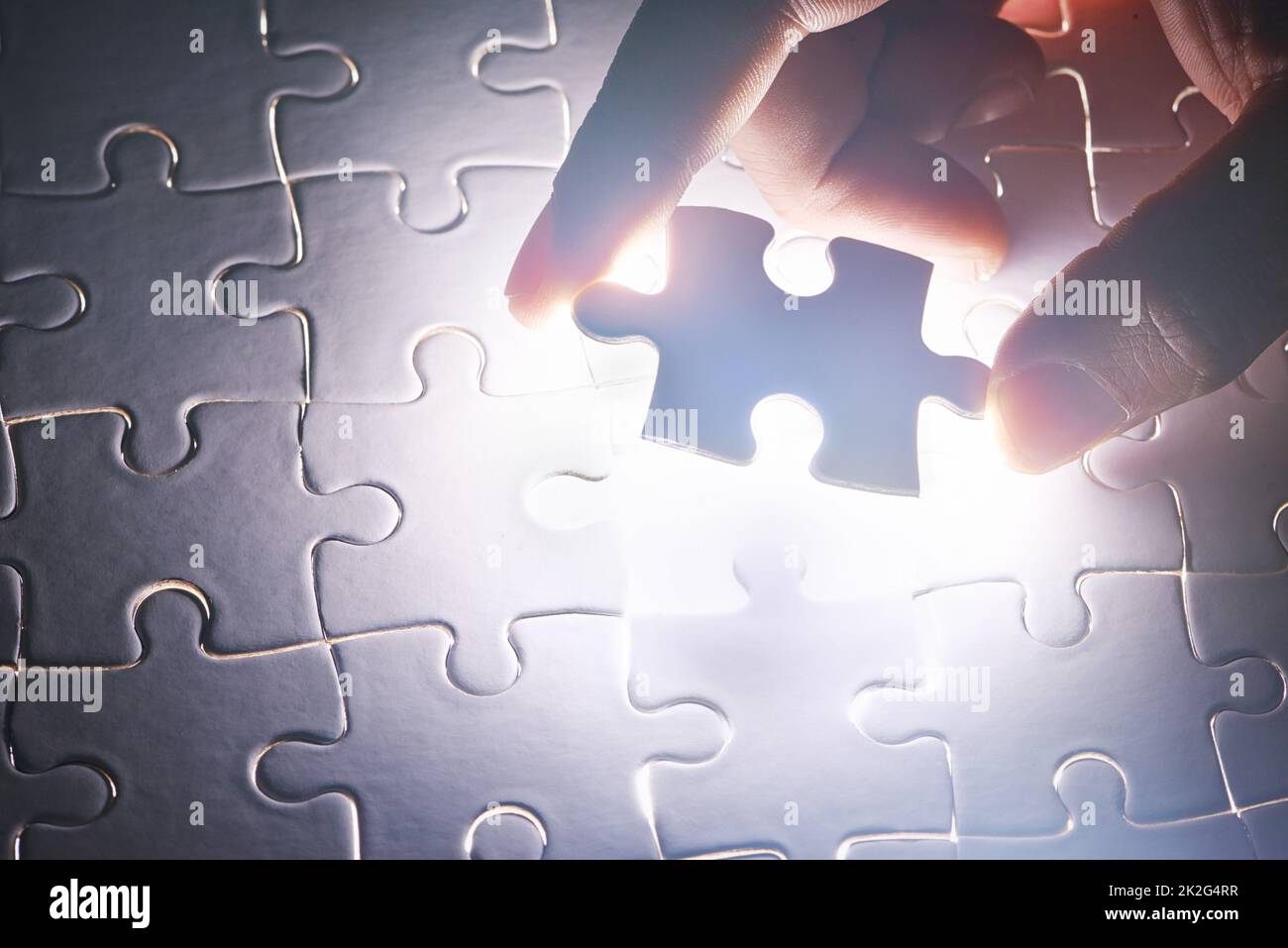 Teamwork puzzle building hi-res stock photography and images - Alamy