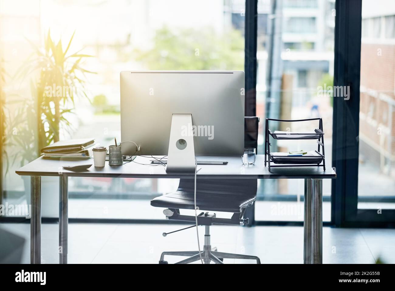 The perfect workstation. Shot of a workstation in an empty office Stock ...