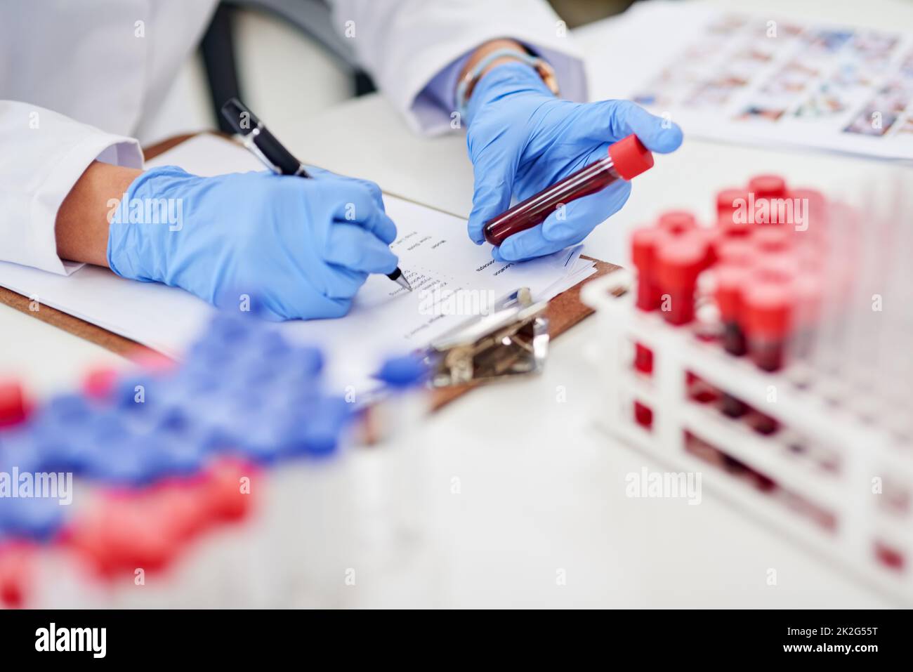 Compiling a detailed report of the latest findings. Closeup shot of a ...