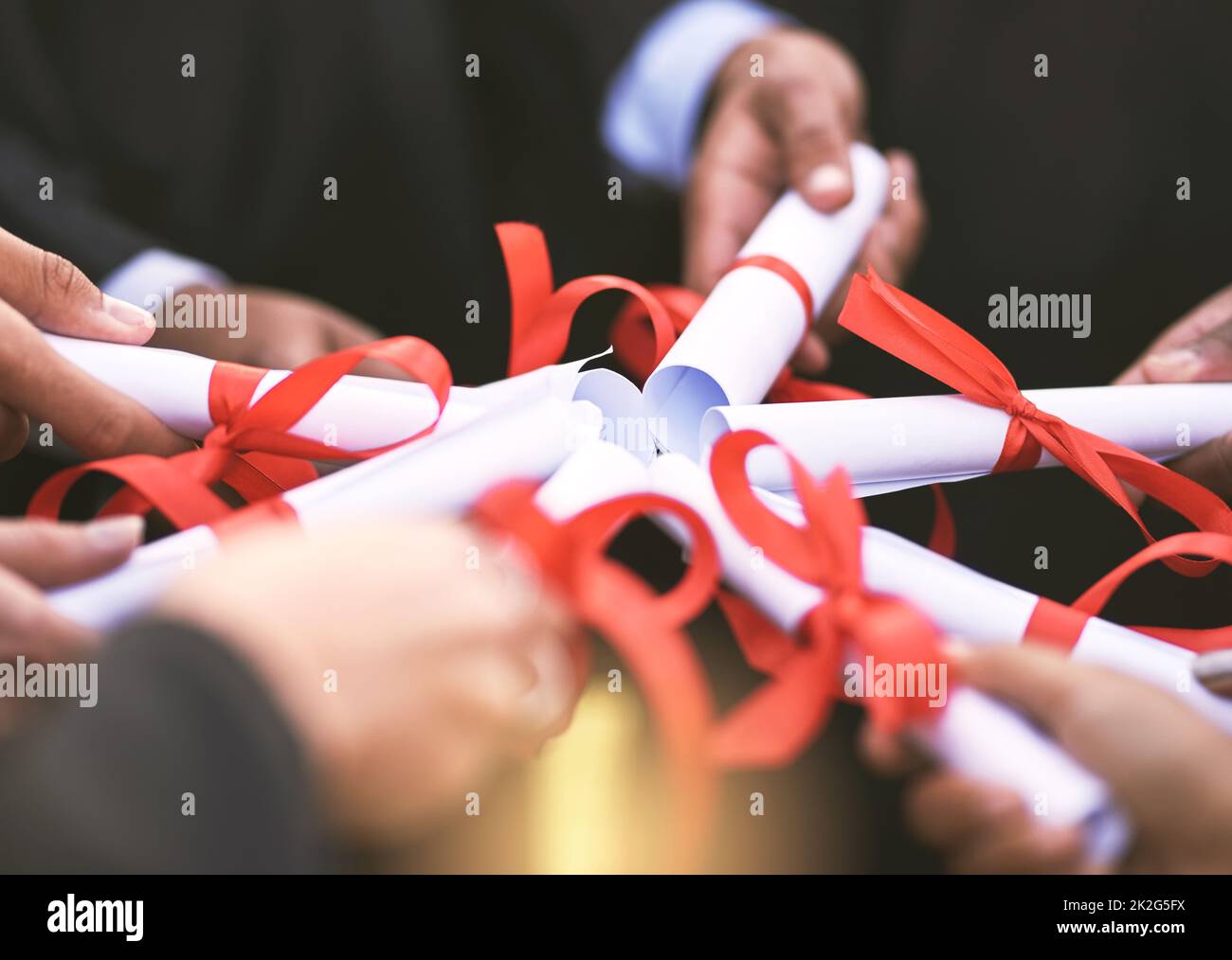 Diplomas in hands hi-res stock photography and images - Alamy
