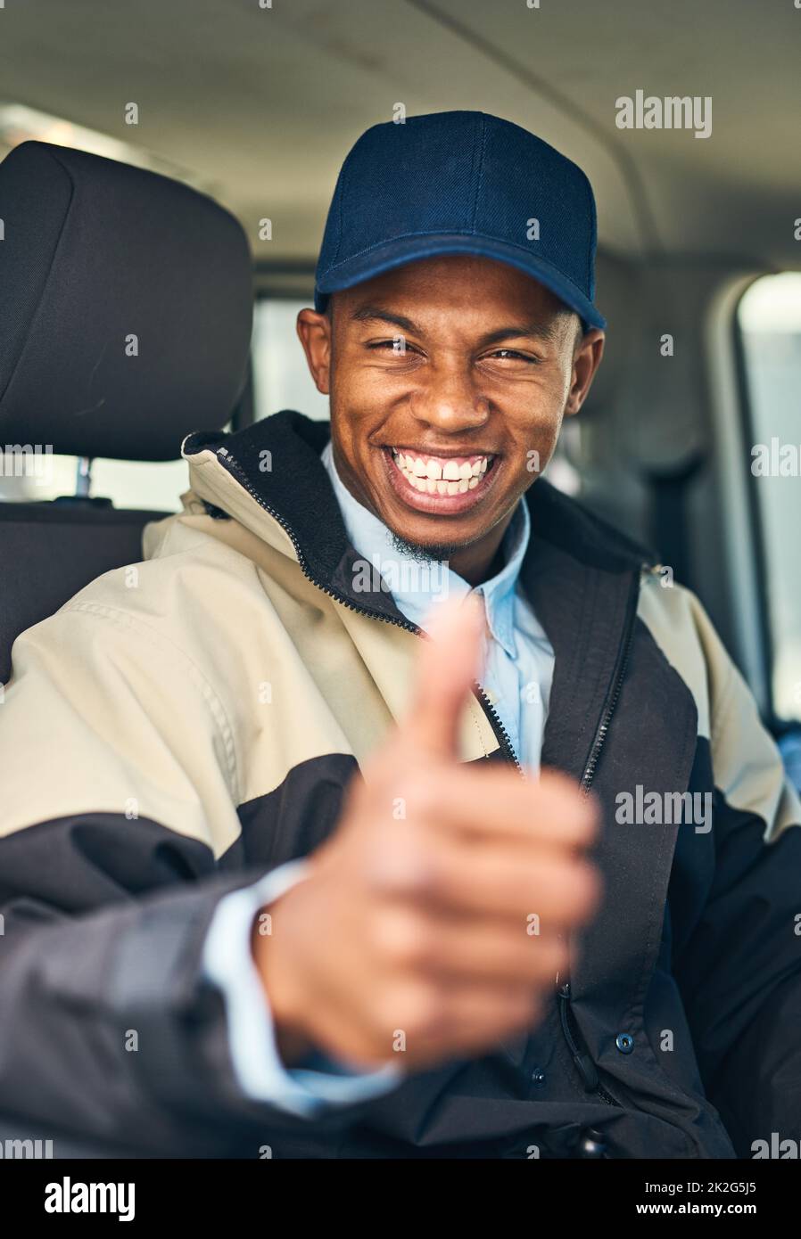 Smiling guy showing thumbs up hi-res stock photography and images - Alamy