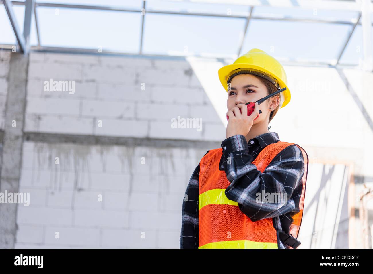 Asian engineer foreman architect worker woman working at building ... Asian engineer foreman architect worker woman working at building ...