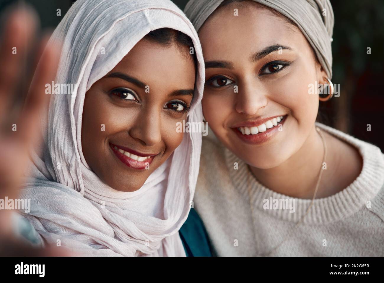 Capture This Cropped Portrait Of Two Affectionate Young Girlfriends Taking A Selfie Together At