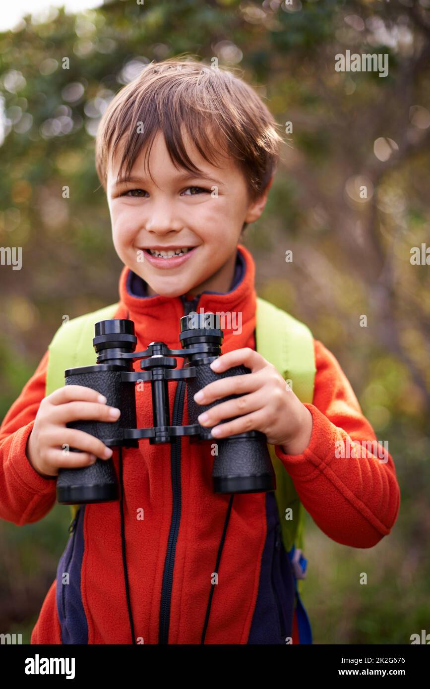 On the lookout for my next adventure. Portrait of a happy young boy out ...