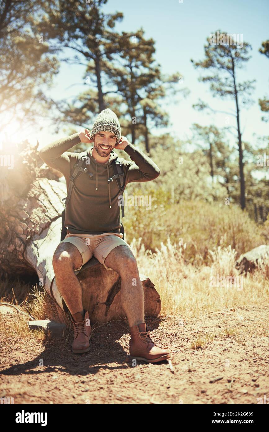 I love coming out here. Full length portrait of a young man taking a ...