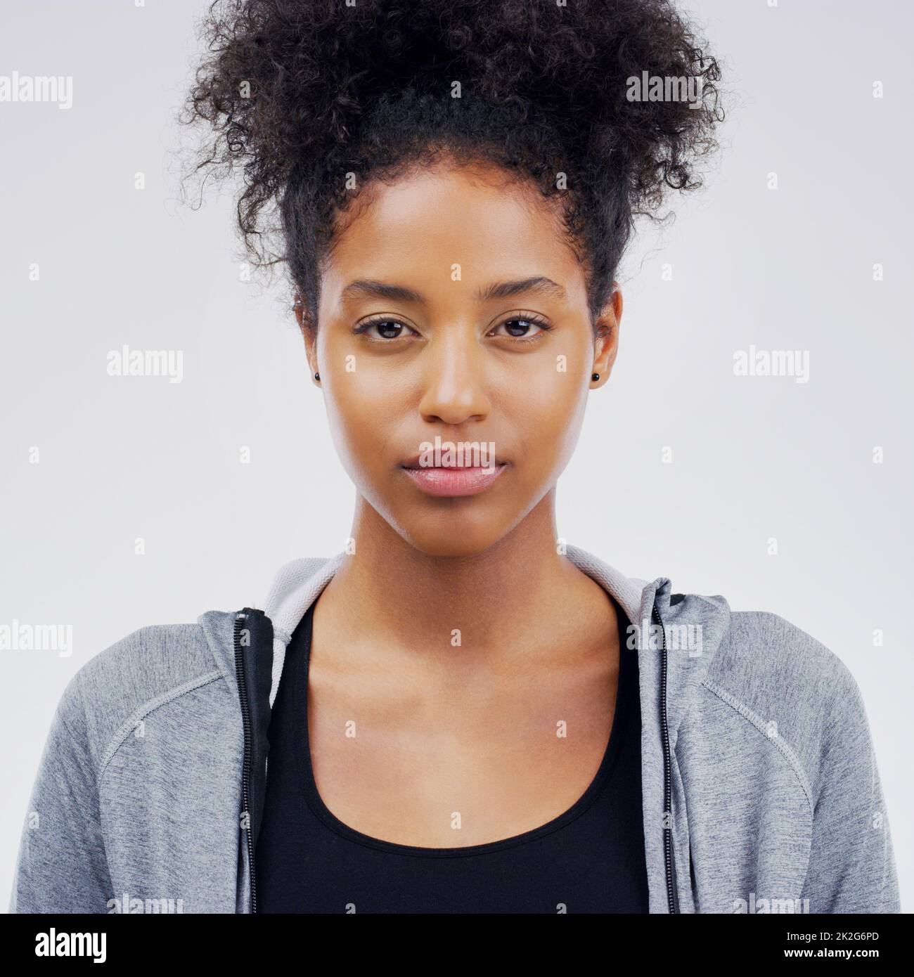 She keeps her feelings hidden. Studio portrait of an attractive young ...