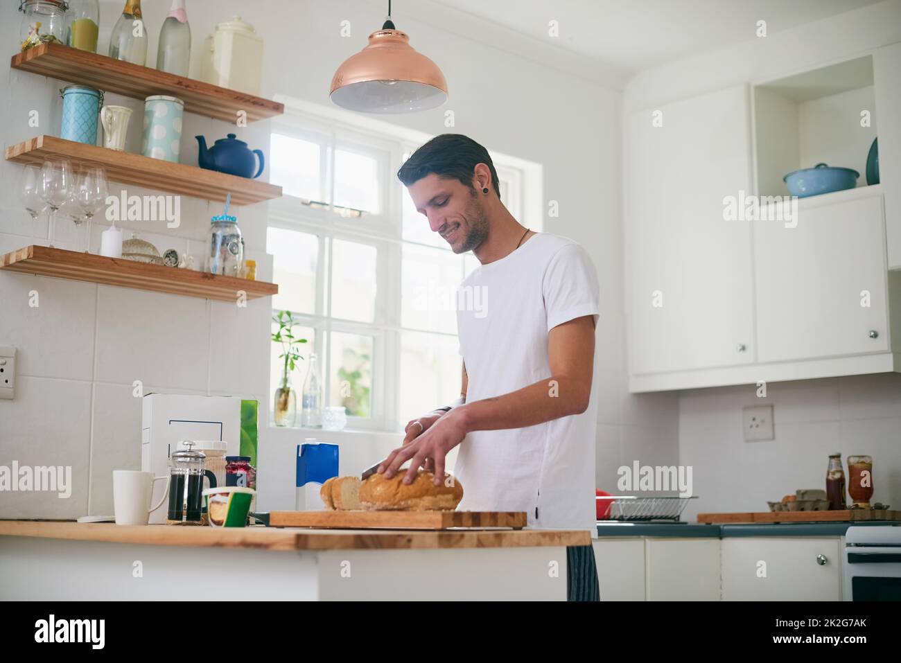 Man eating sandwich standing hi-res stock photography and images - Alamy