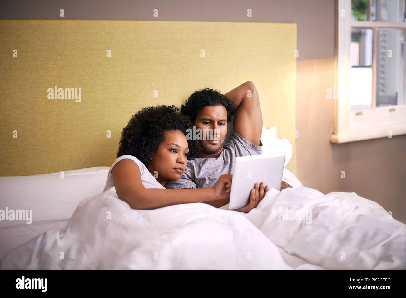 Who Says Were Too Old For A Bedtime Story Portrait Of A Young Couple