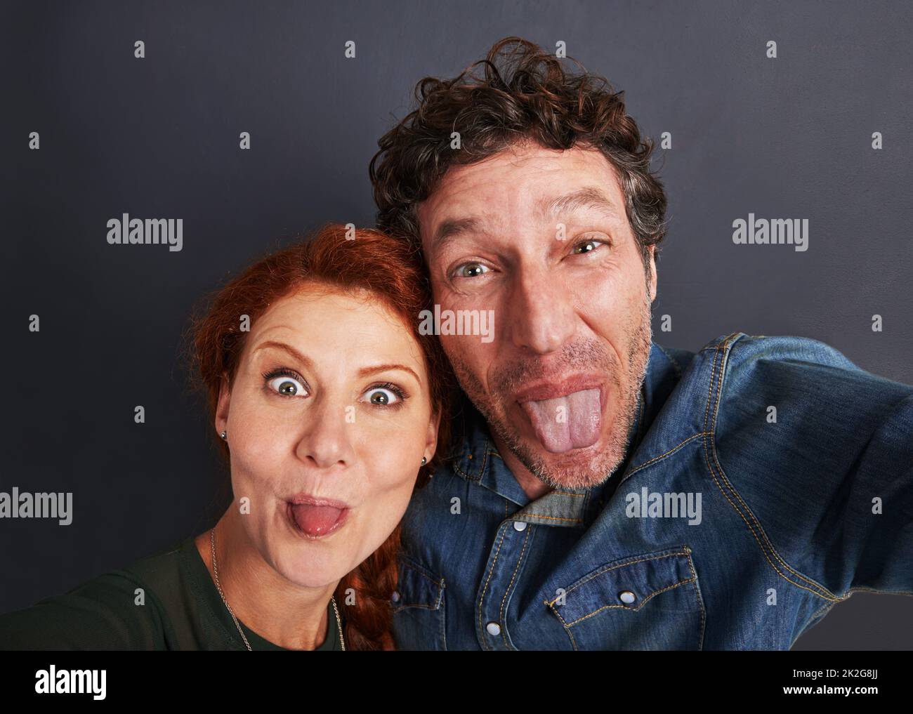 Pulling funny faces adults hi-res stock photography and images - Alamy