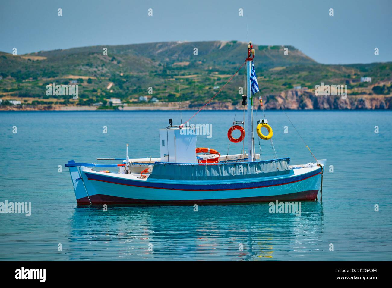 Greek fishing boat in Aegean sea near Milos island, Greece Stock Photo ...