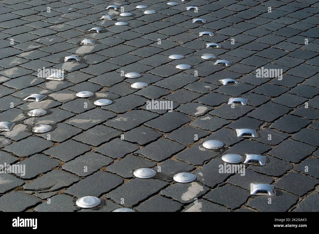 On the street, stones, patterns and structure of a historic cobblestone ...