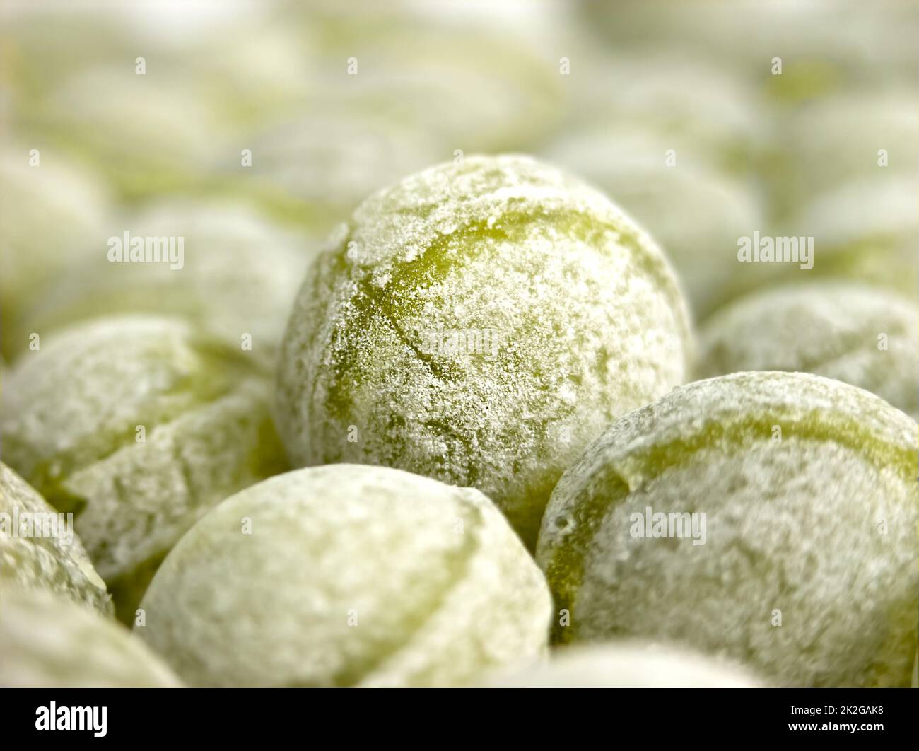 Detail and closeup of green apple candies Stock Photo - Alamy
