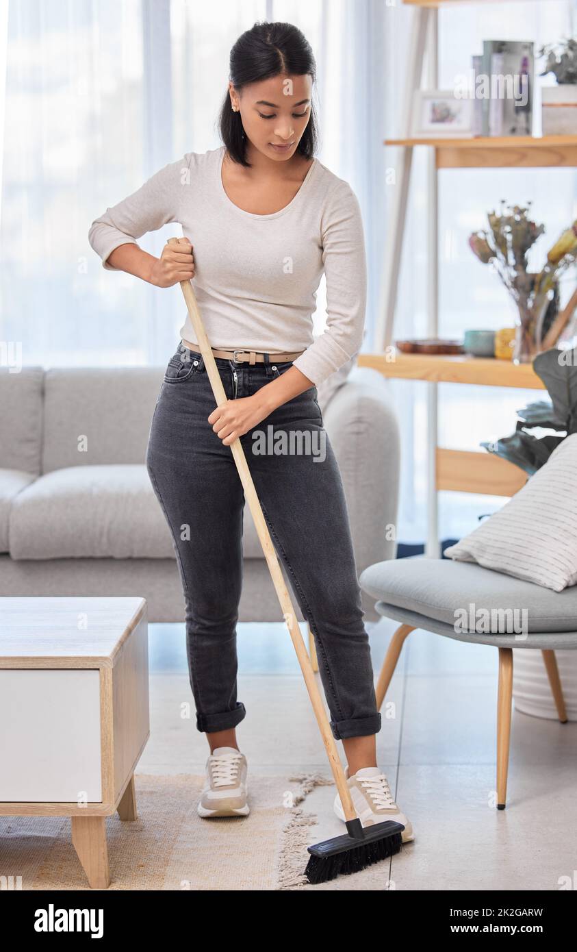 Woman sweeping floor hi-res stock photography and images - Alamy