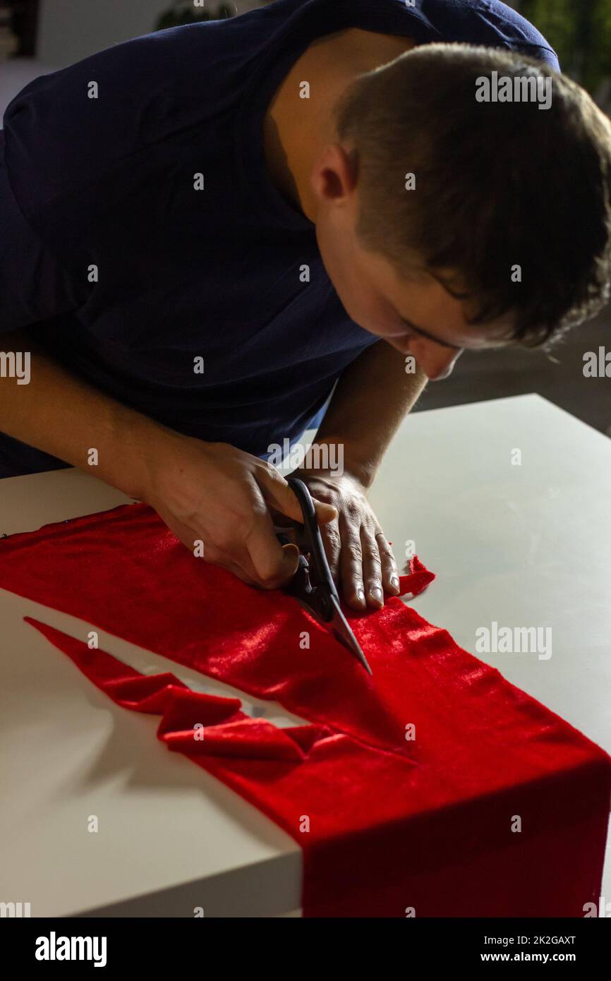Hands of experienced worker in the handmade industry, performing ...