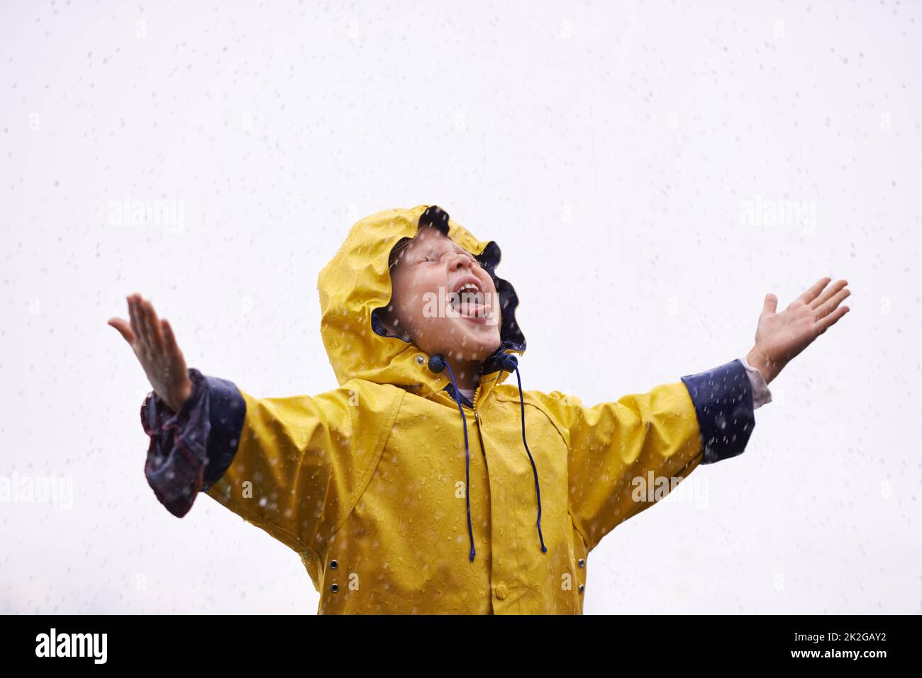 Having fun with Mother Nature. an adorable little girl playing outside ...