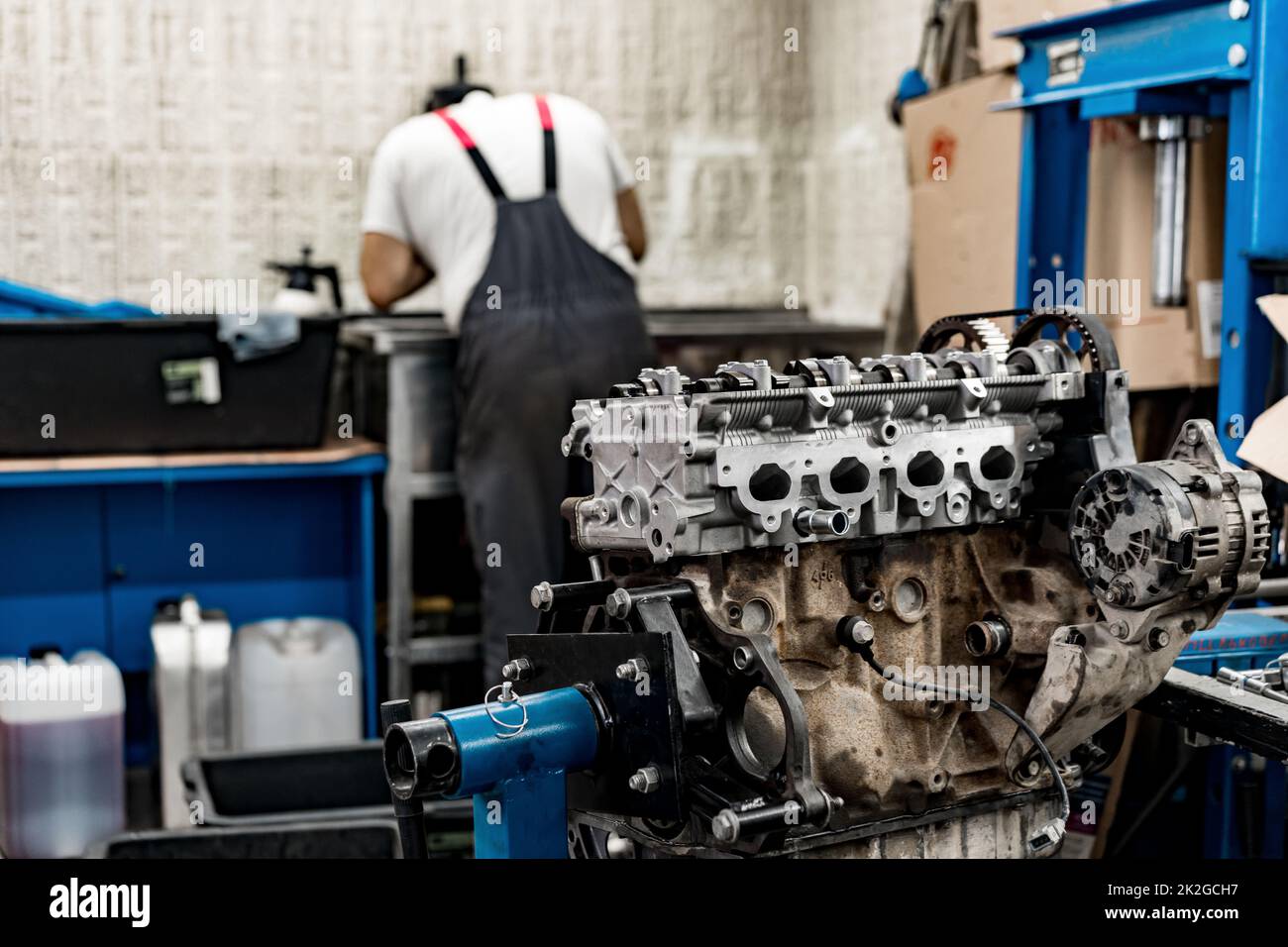 Disassembled car engine block at car service station Stock Photo - Alamy