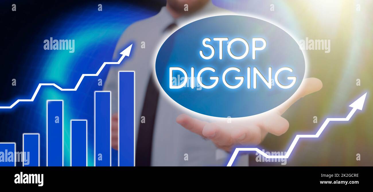 Hand writing sign Stop Digging. Word Written on Prevent Illegal ...