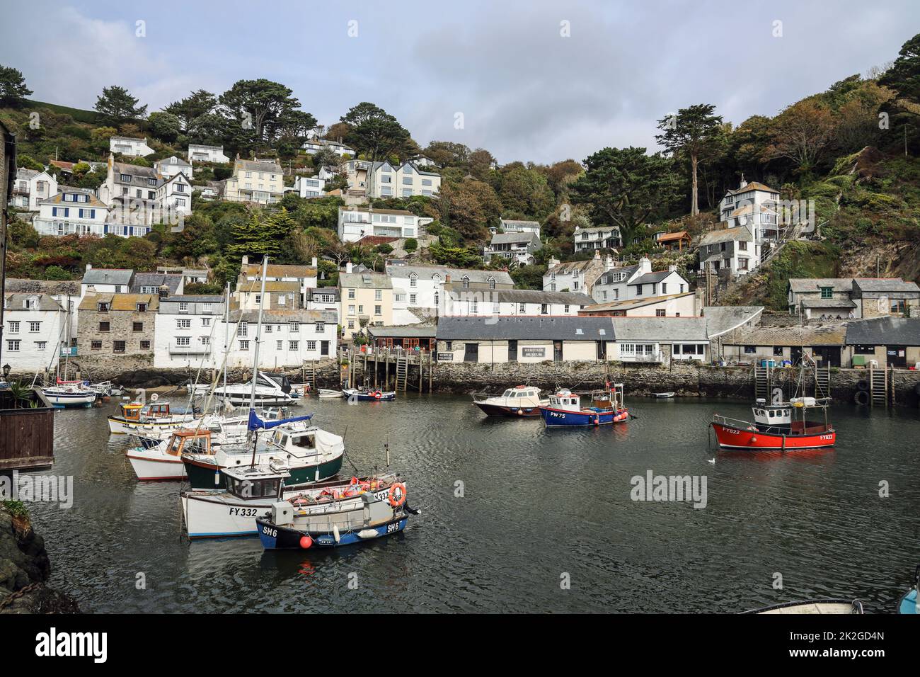 Fishing and leisure boats berthed at the harbour of Polperro in south ...