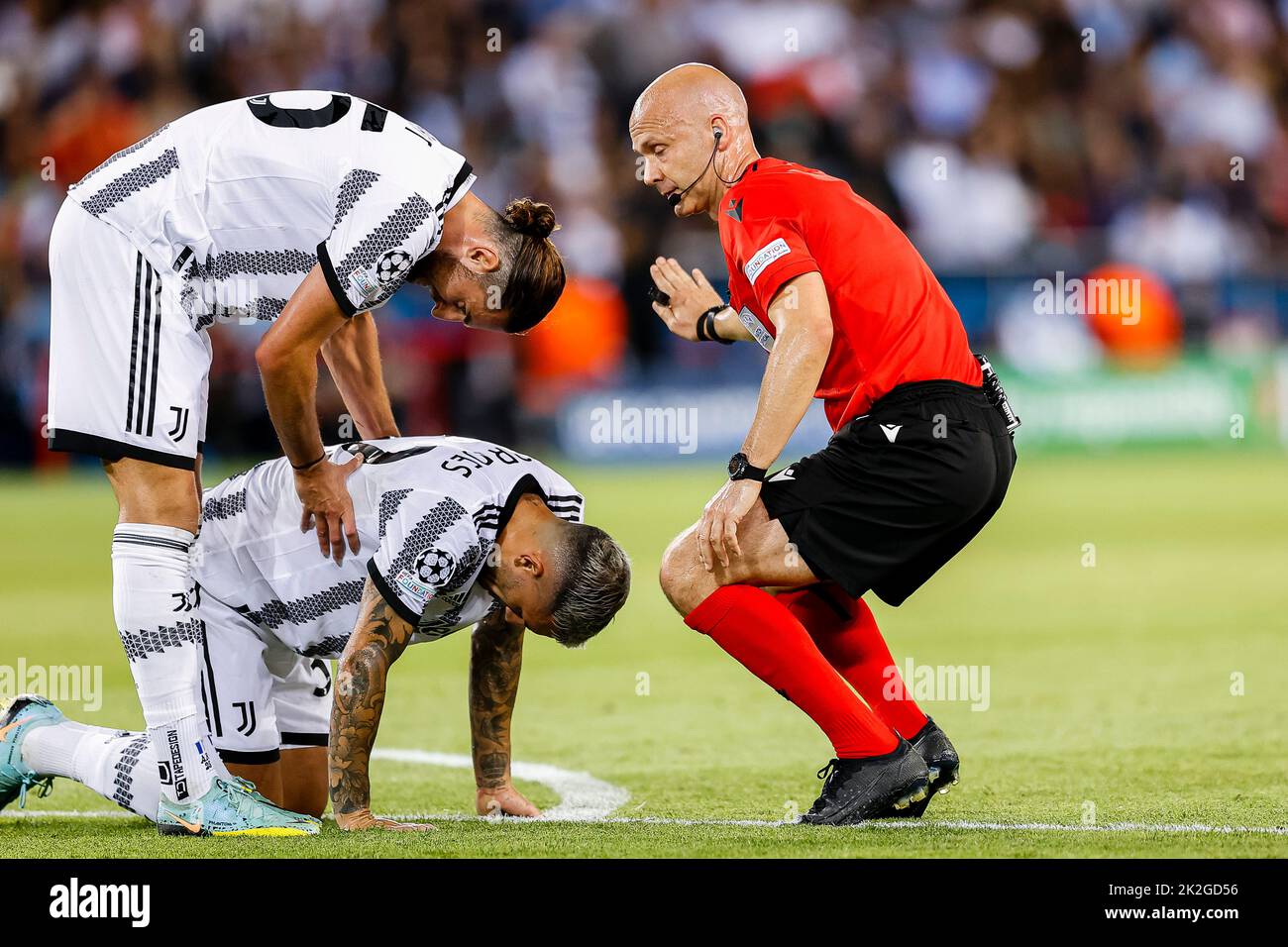 PARIS, FRANCE - SEPTEMBER 06: Referee Anthony Taylor (R) assists ...