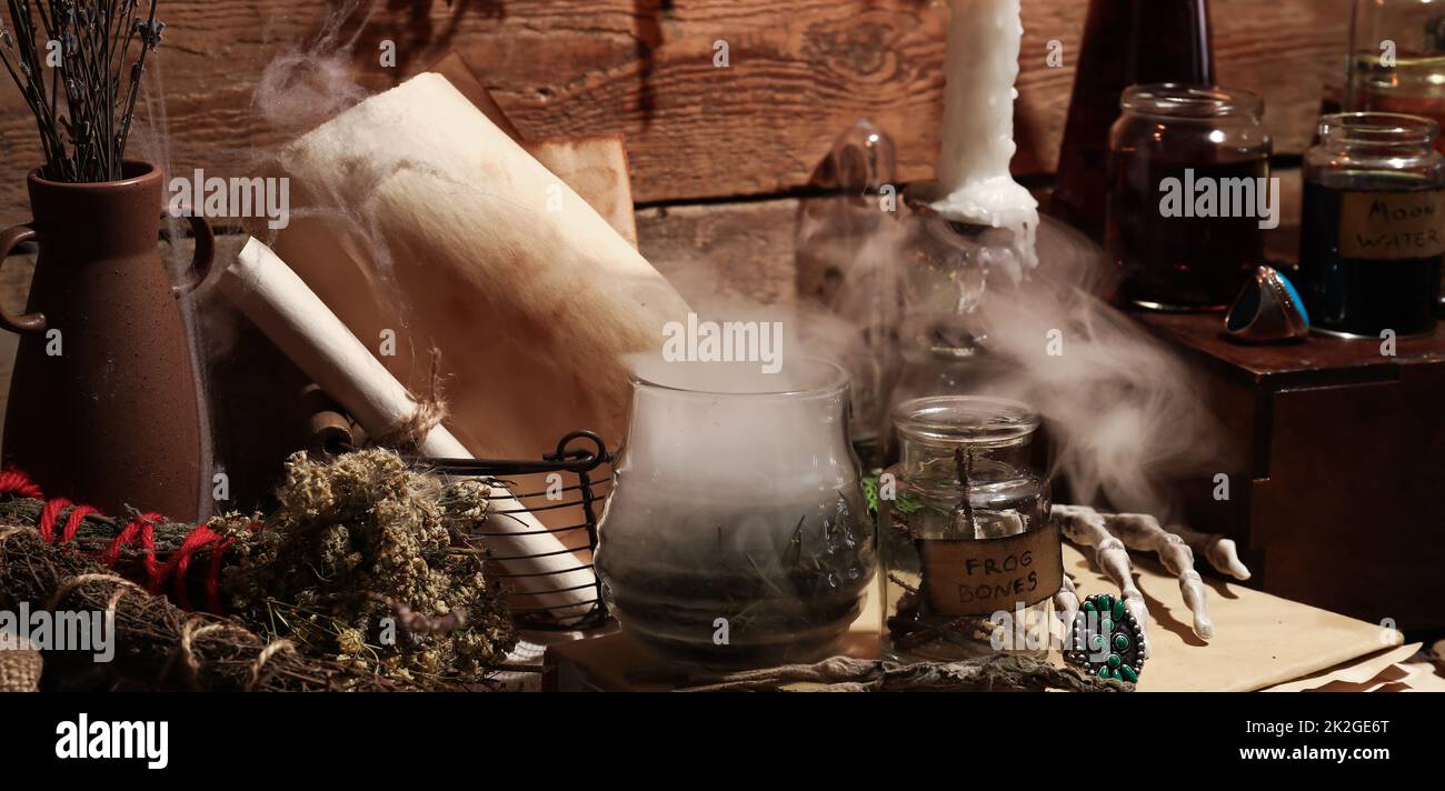 Ingredients for witch's ritual on wooden background Stock Photo - Alamy
