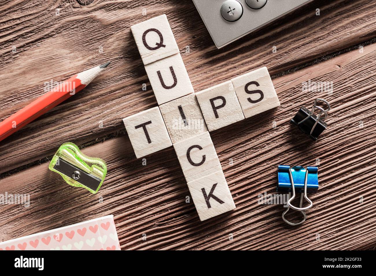 Conceptual business keywords on table with elements of game making ...