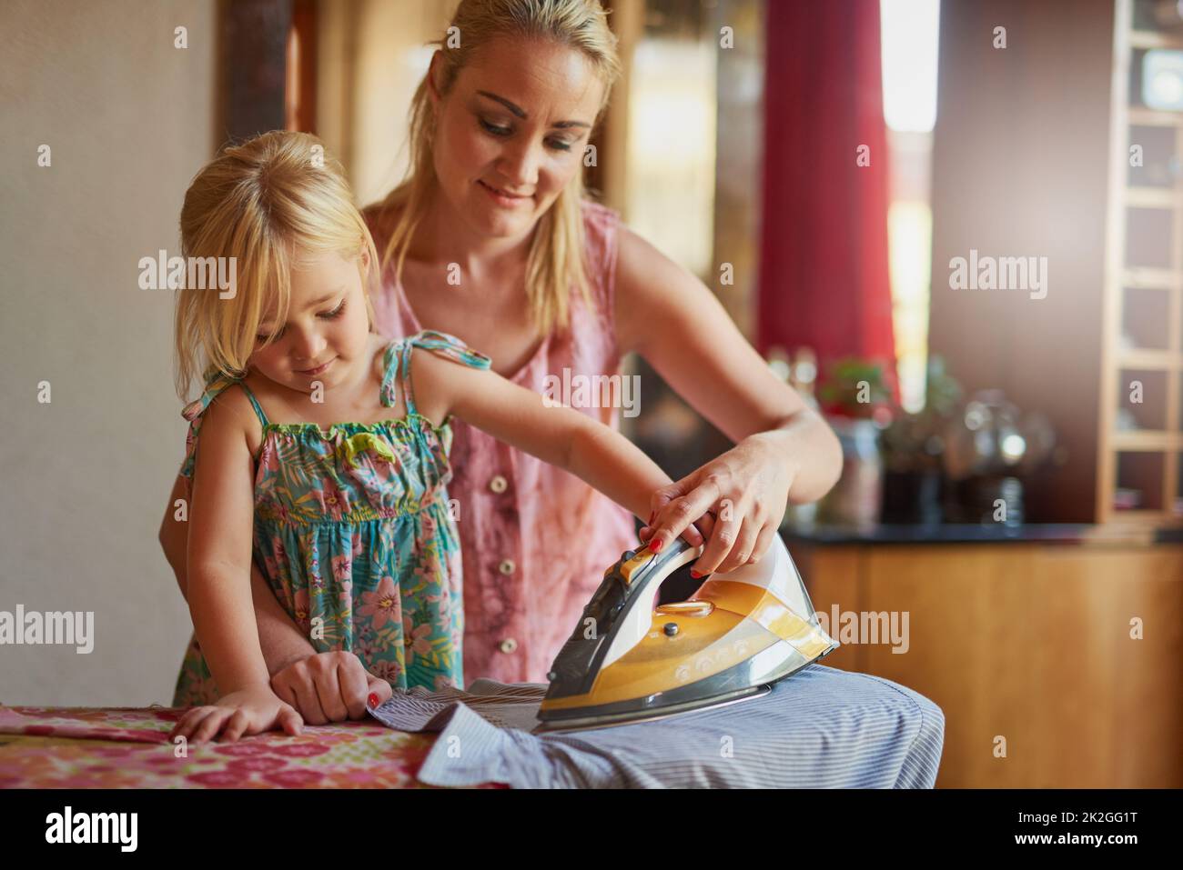 Kids helping with chores hi-res stock photography and images - Alamy